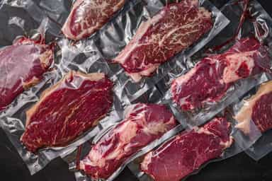 How Should Raw Animal Proteins be Stacked Prior to Cooking?